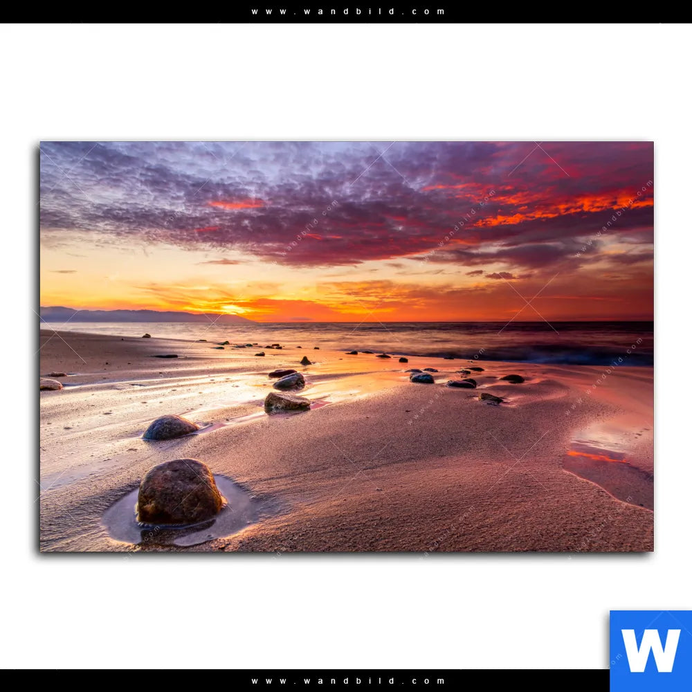 Poster ♥️ Sonnenuntergang am Strand mit Felsen | Querformat | wandbild.com